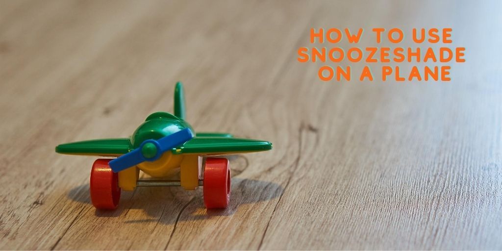How to use SnoozeShade on a plane with an airplane bassinet or sky cot ...
